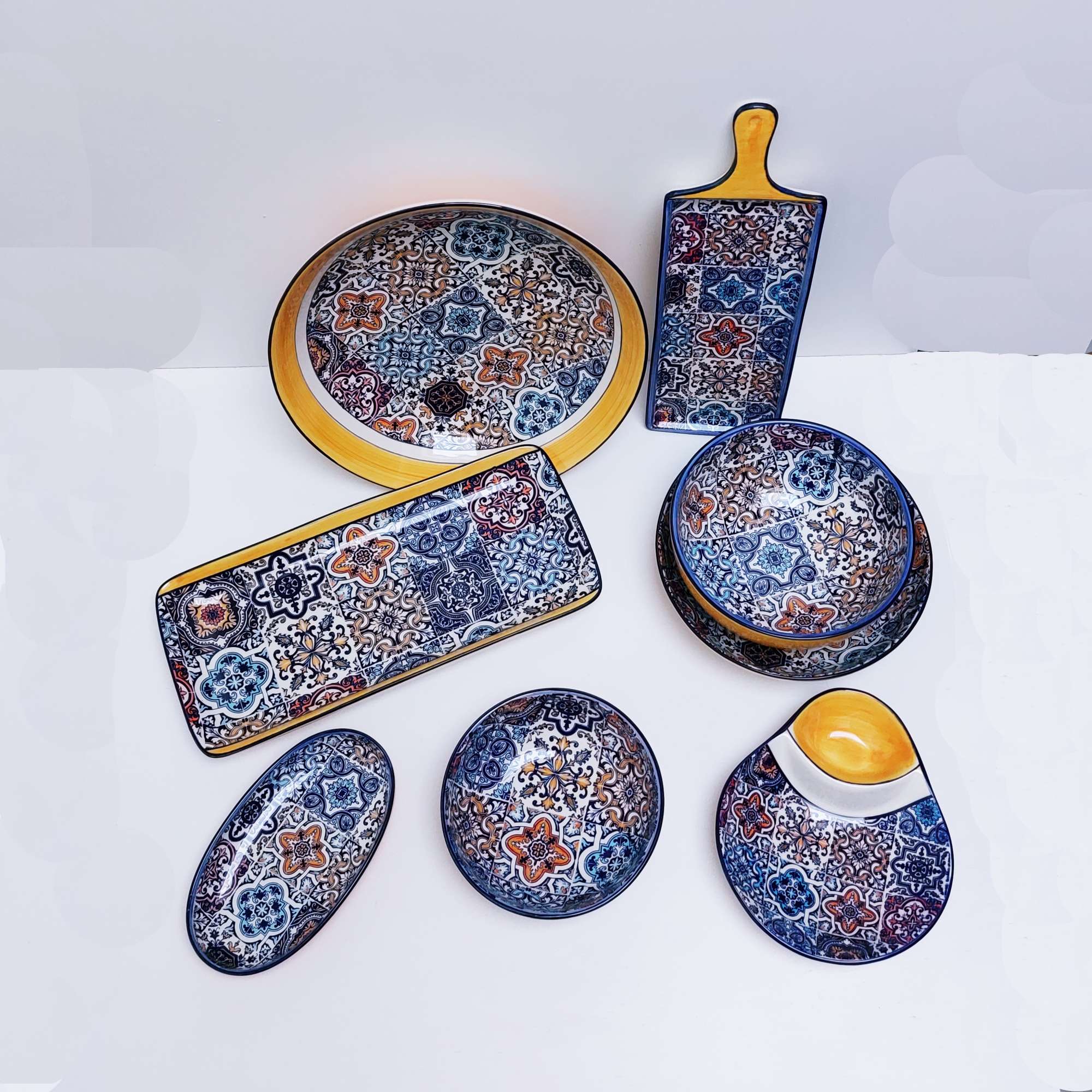 Typical Portuguese ceramic tableware with designs of the typical tiles ...